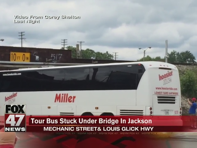 Bus stuck under bridge in Jackson Tuesday